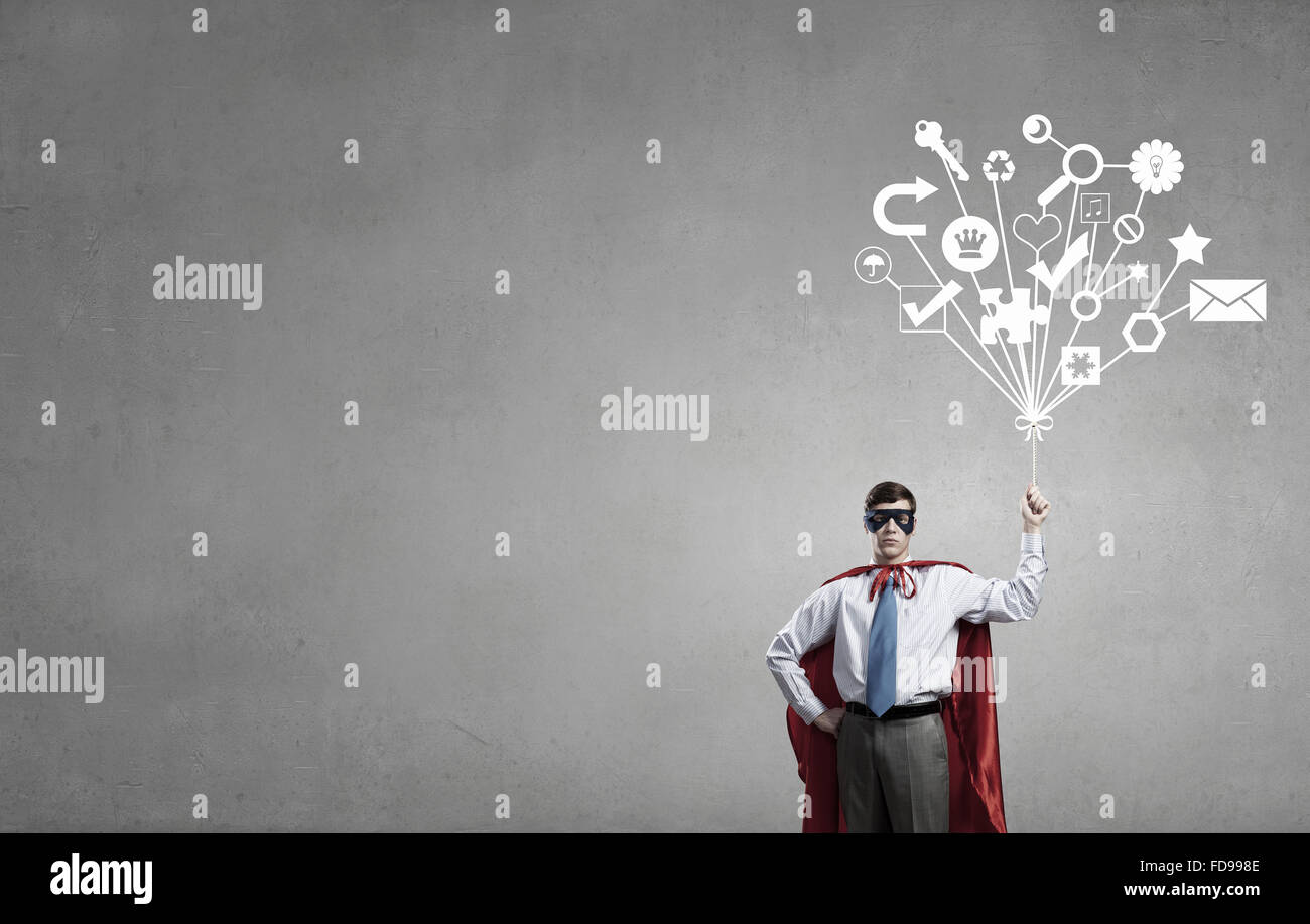 Young man in superhero costume representing creativity concept Stock ...