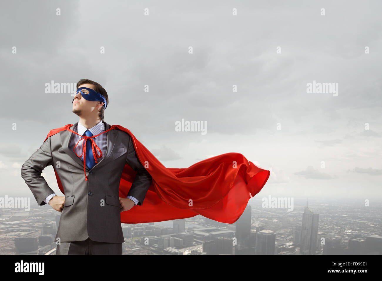 Young man in superhero costume representing power and courage Stock ...