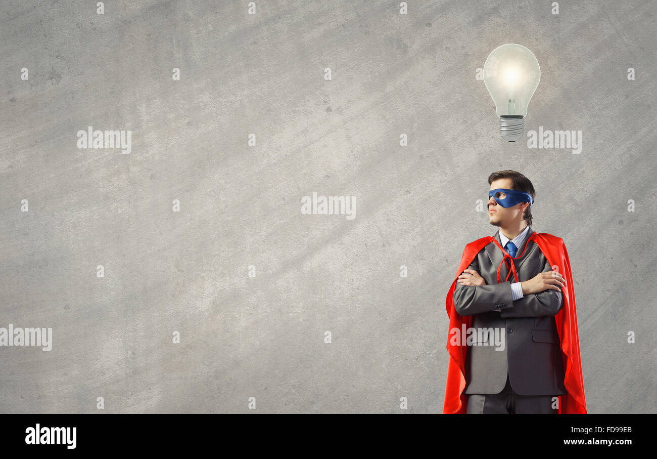 Young man in superhero costume representing creativity concept Stock ...
