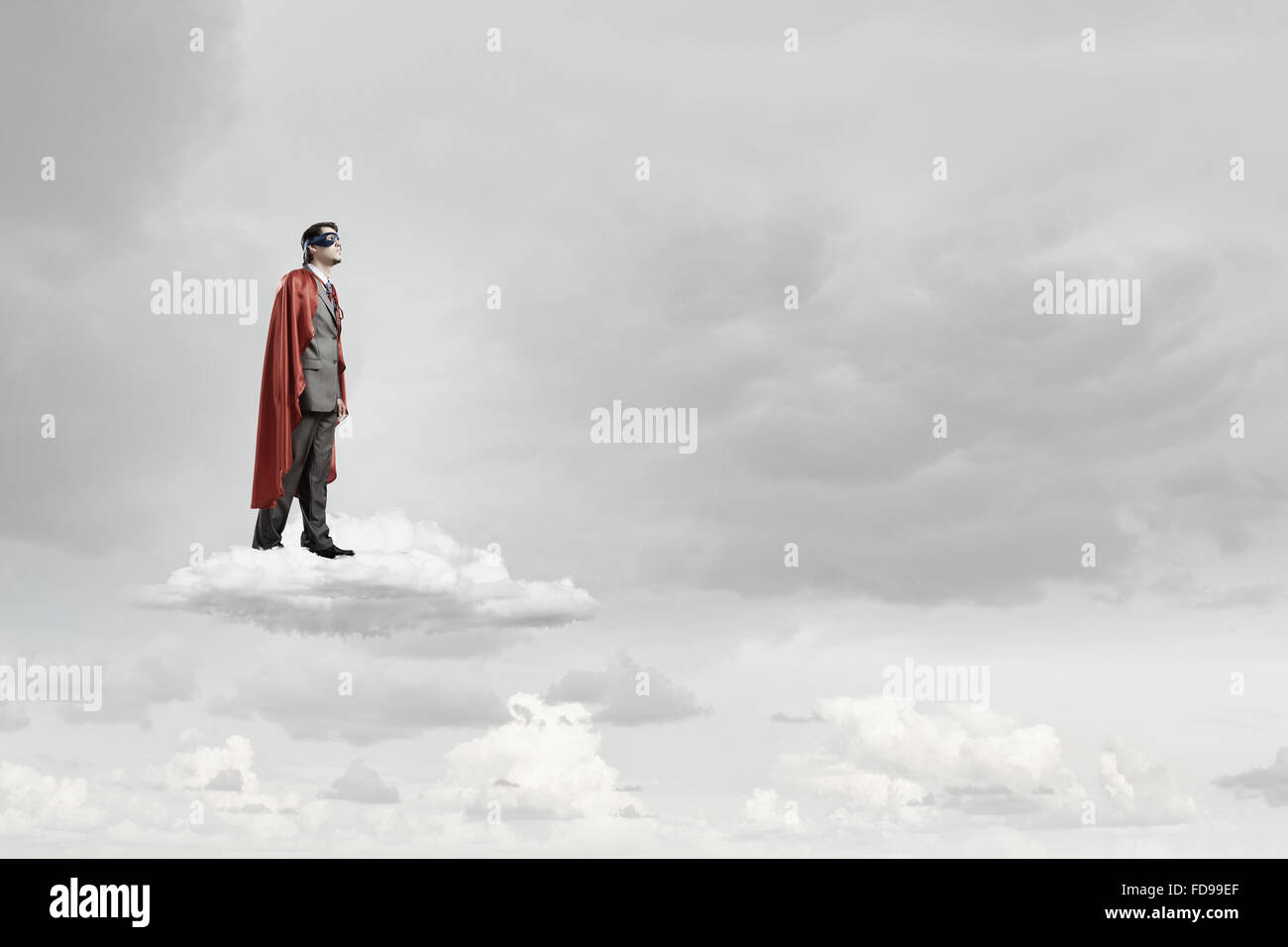 Young man in superhero costume representing power and courage Stock ...