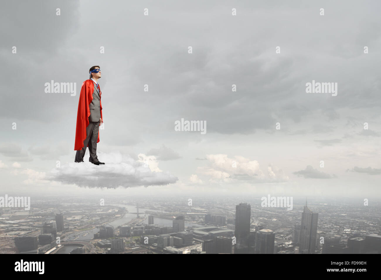Young man in superhero costume representing power and courage Stock ...