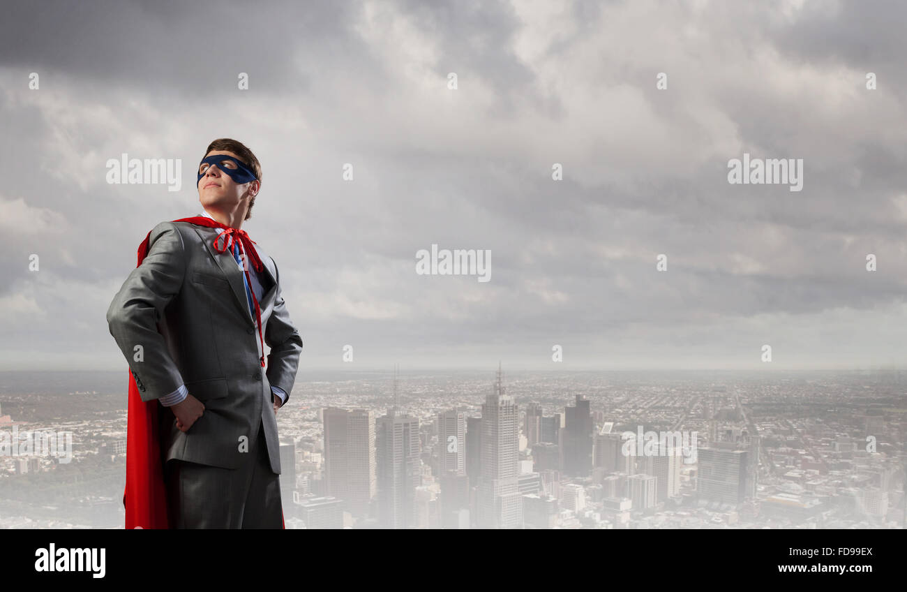 Young man in superhero costume representing power and courage Stock ...