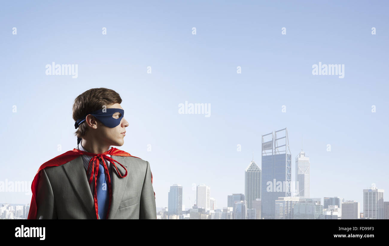 Young man in superhero costume representing power and courage Stock ...