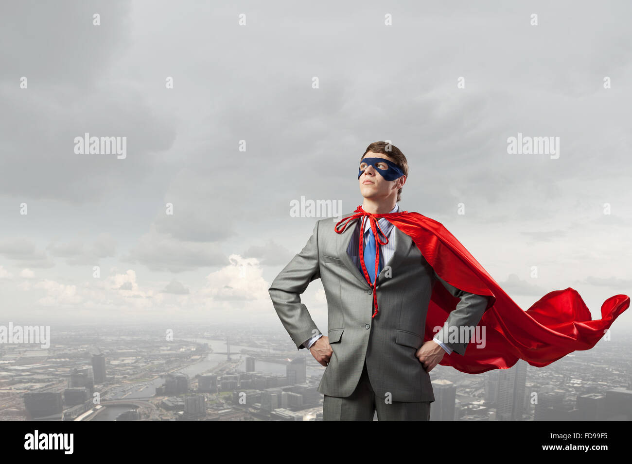 Young man in superhero costume representing power and courage Stock ...