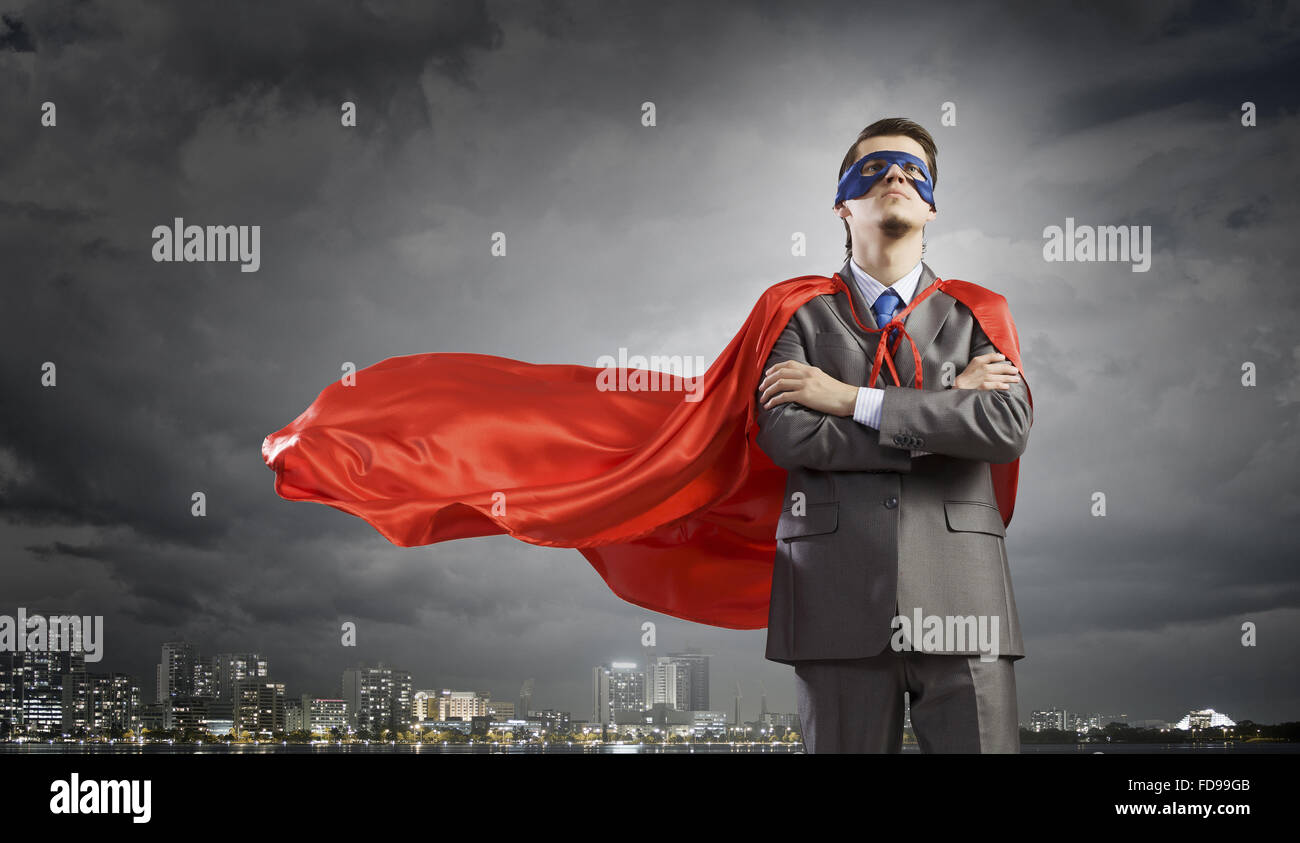 Young man in superhero costume representing power and courage Stock ...
