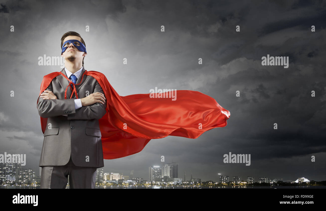 Young man in superhero costume representing power and courage Stock ...