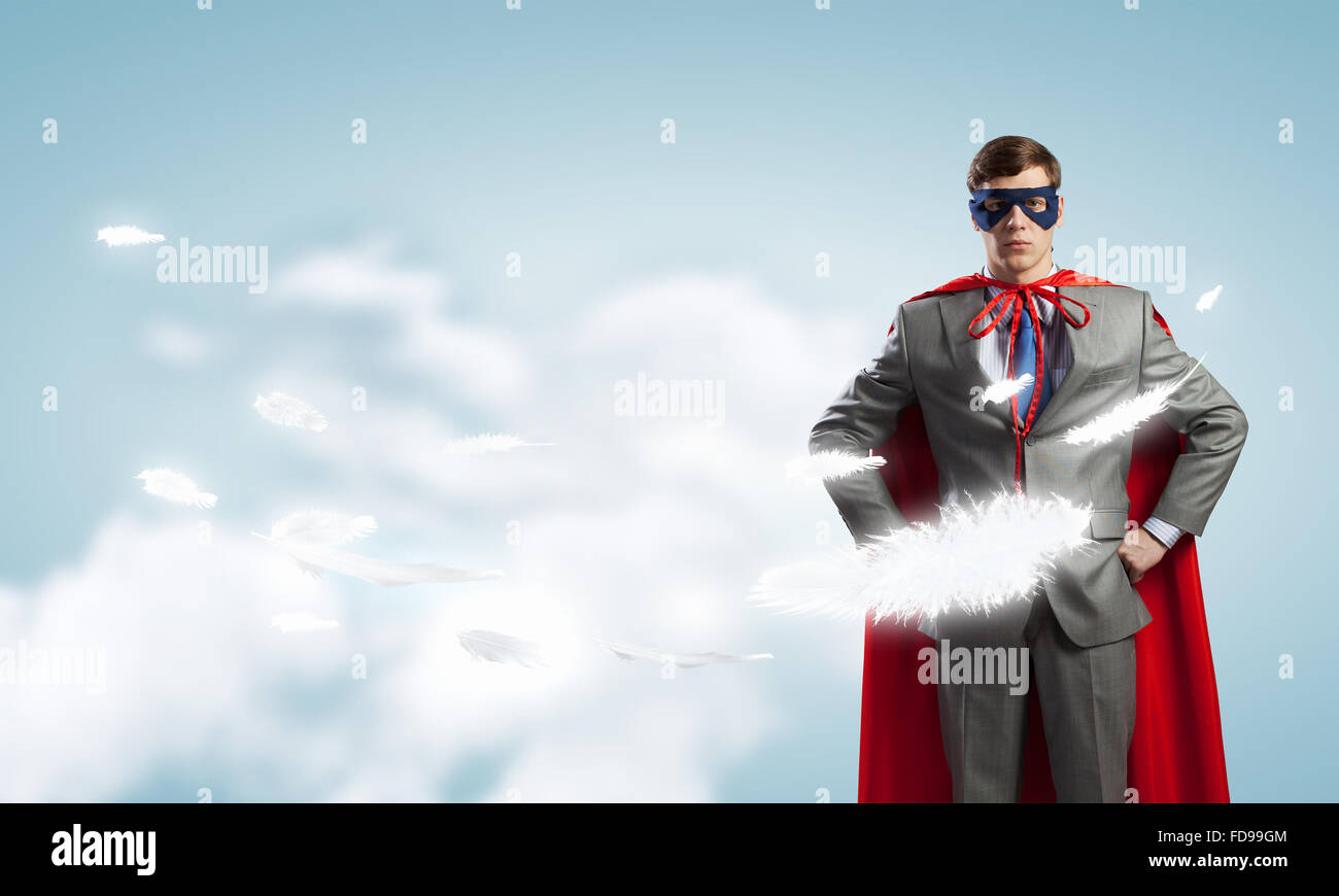 Young man in superhero costume representing power and courage Stock ...