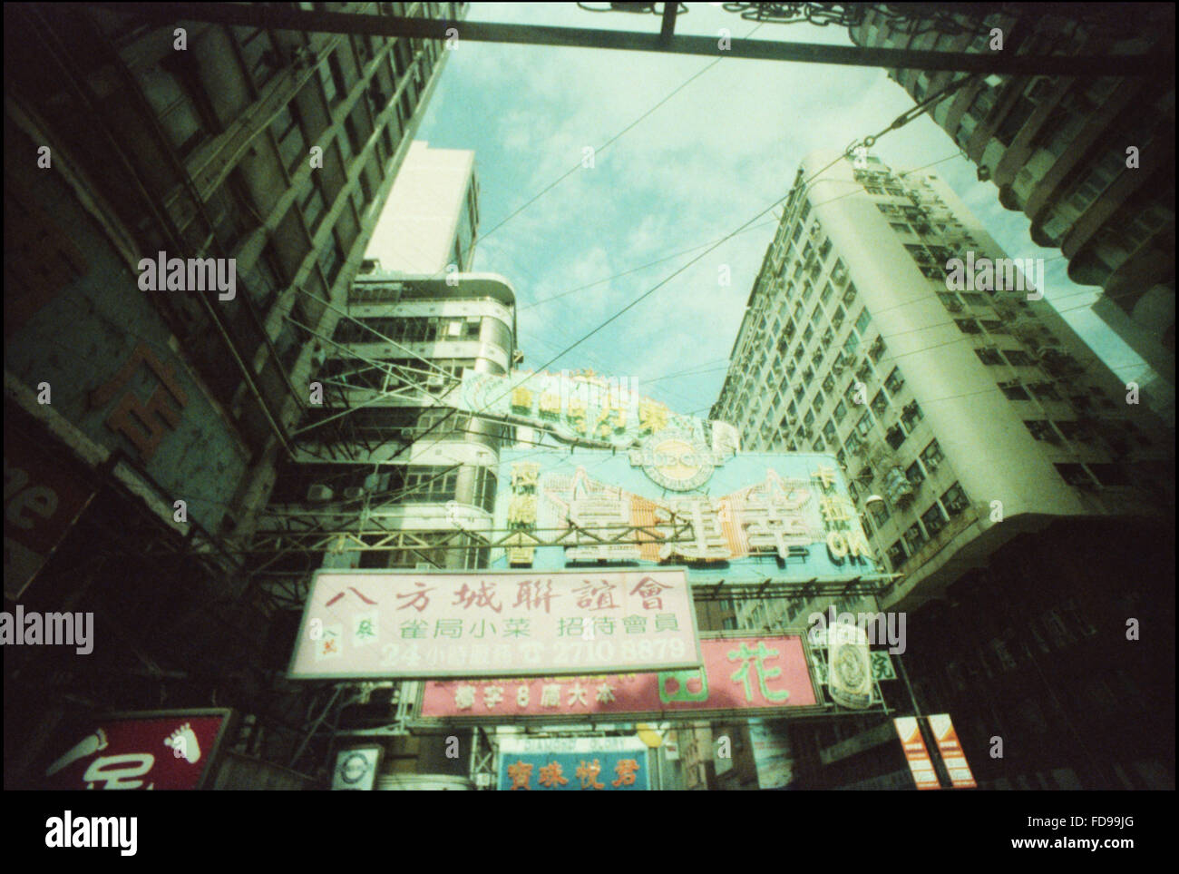 Low Angle View Of Sign Boards Against Buildings Stock Photo - Alamy