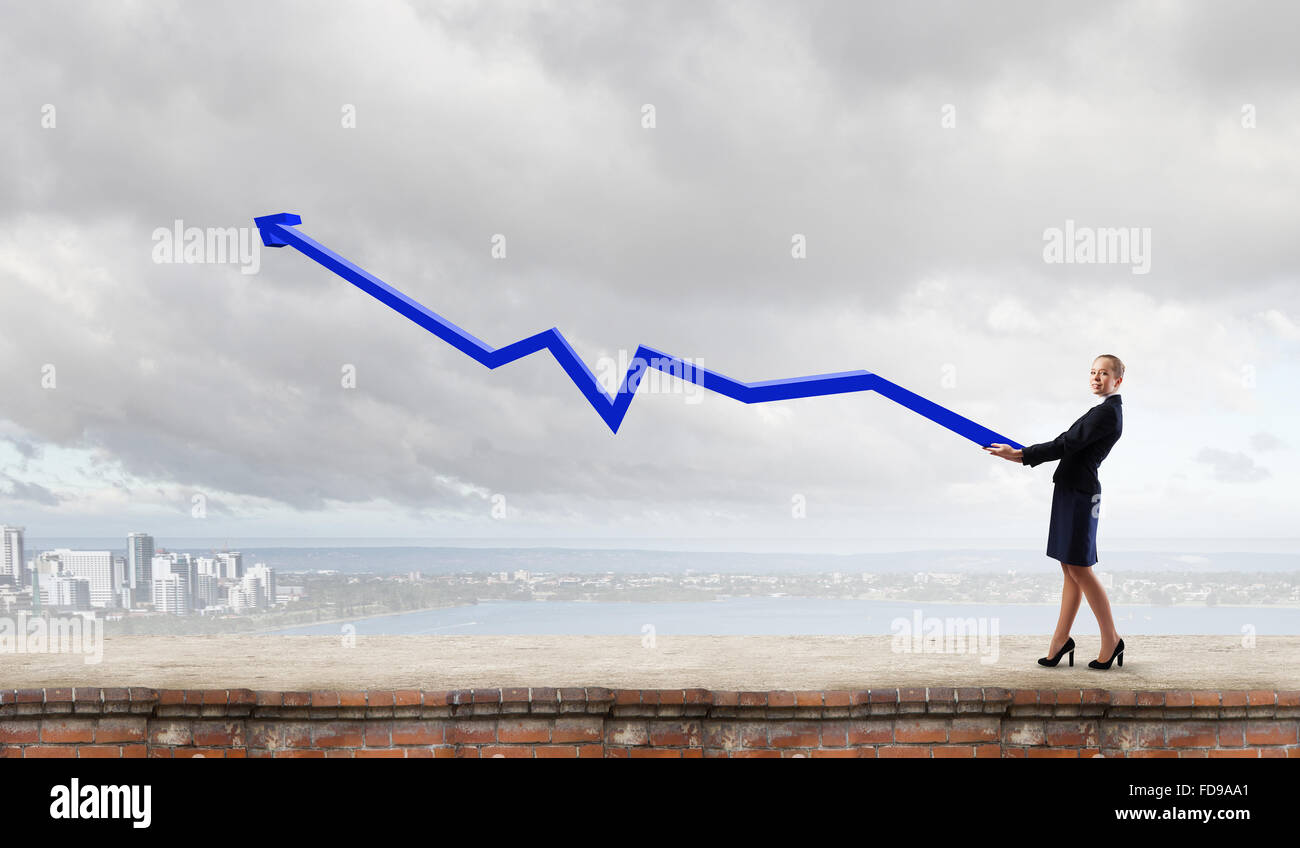 Businesswoman carrying big increasing graph. Growth concept Stock Photo ...