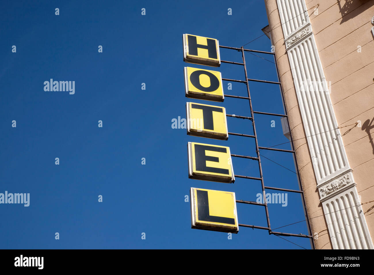 Hotel Sign against Blue Sky Background Stock Photo - Alamy