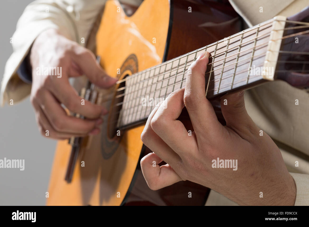 Close up of male hands playing acoustic guitar Stock Photo - Alamy