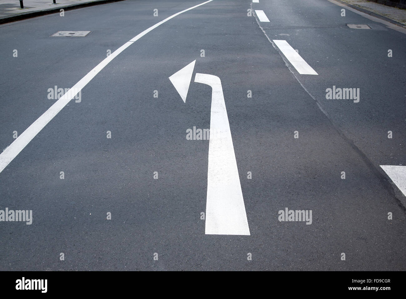 Left Turn Arrow in Urban Street Stock Photo - Alamy