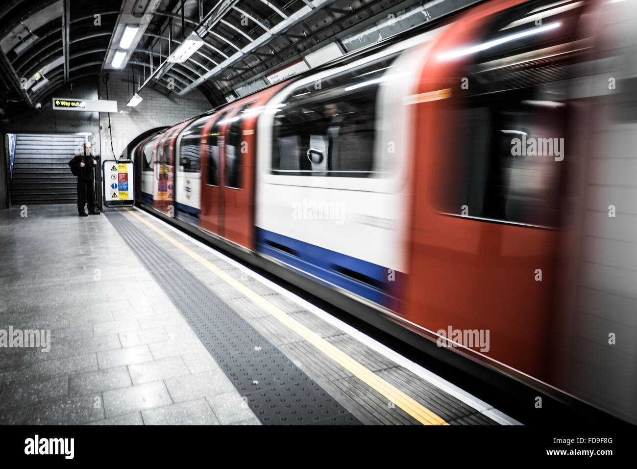 London Underground Tube train approaches station Stock Photo - Alamy