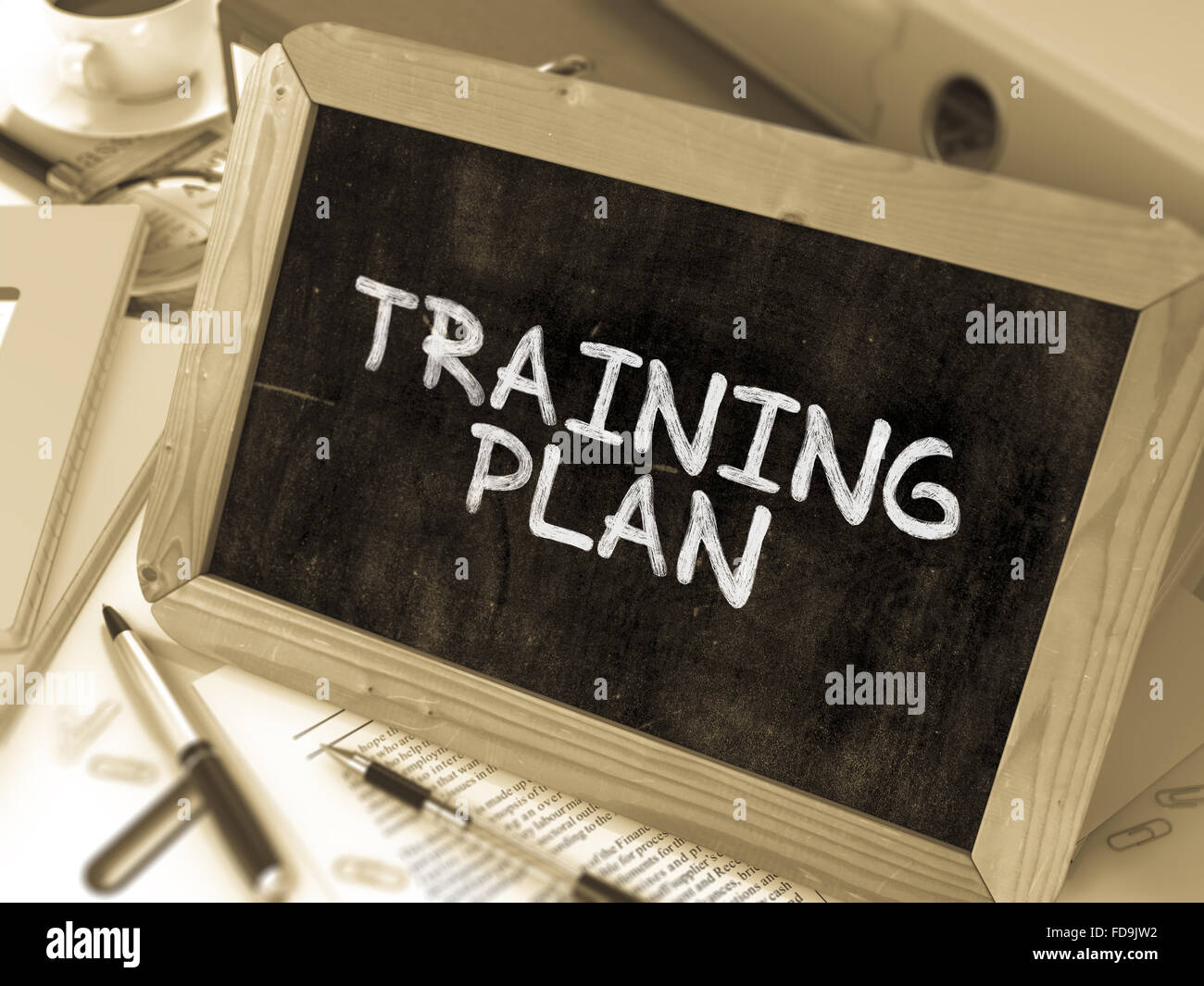 Training Plan Concept Hand Drawn on Chalkboard on Working Table ...