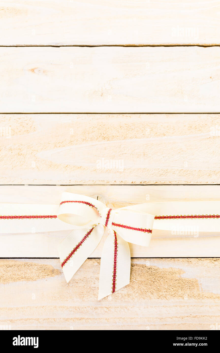 Classic bow made of wide white ribbon Stock Photo - Alamy