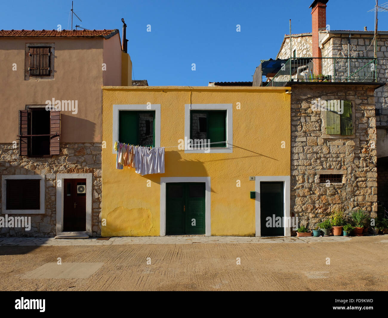 Jelsa, Croatia, new and old buildings in the old town Stock Photo - Alamy