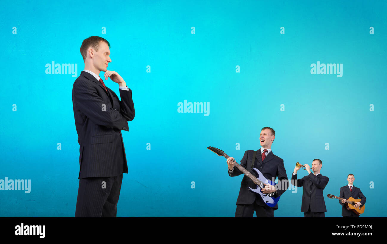 Young man in suit and people playing different music instruments Stock ...
