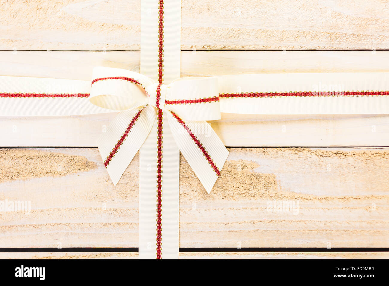 Classic bow made of wide white ribbon Stock Photo - Alamy