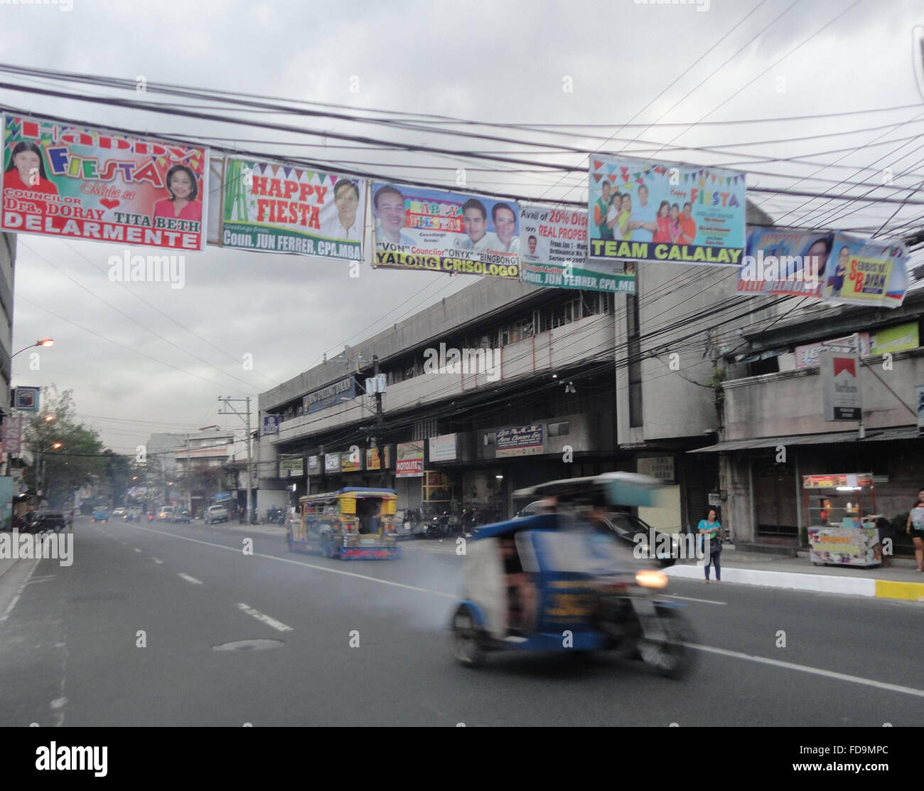 Posters of Filipino politicians greeting its constituents adorn a road ...