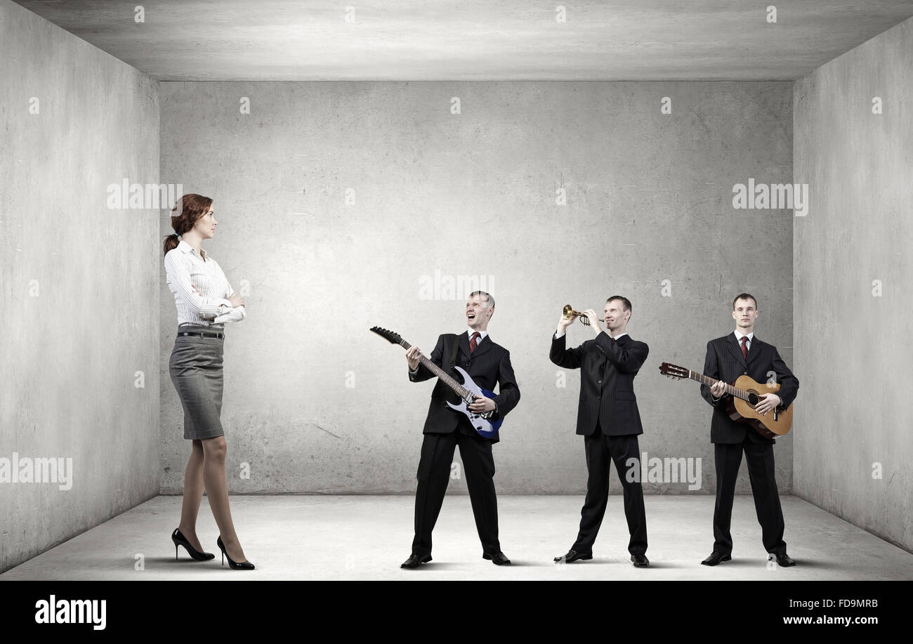 Young man in suit and people playing different music instruments Stock ...