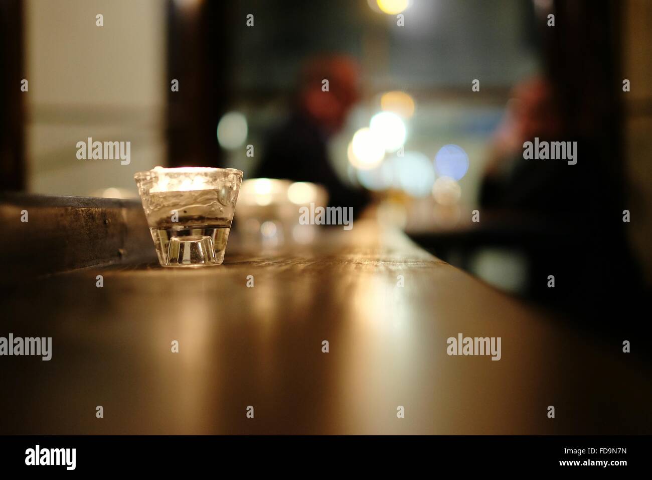Beer Glass On Table In Restaurant Stock Photo - Alamy