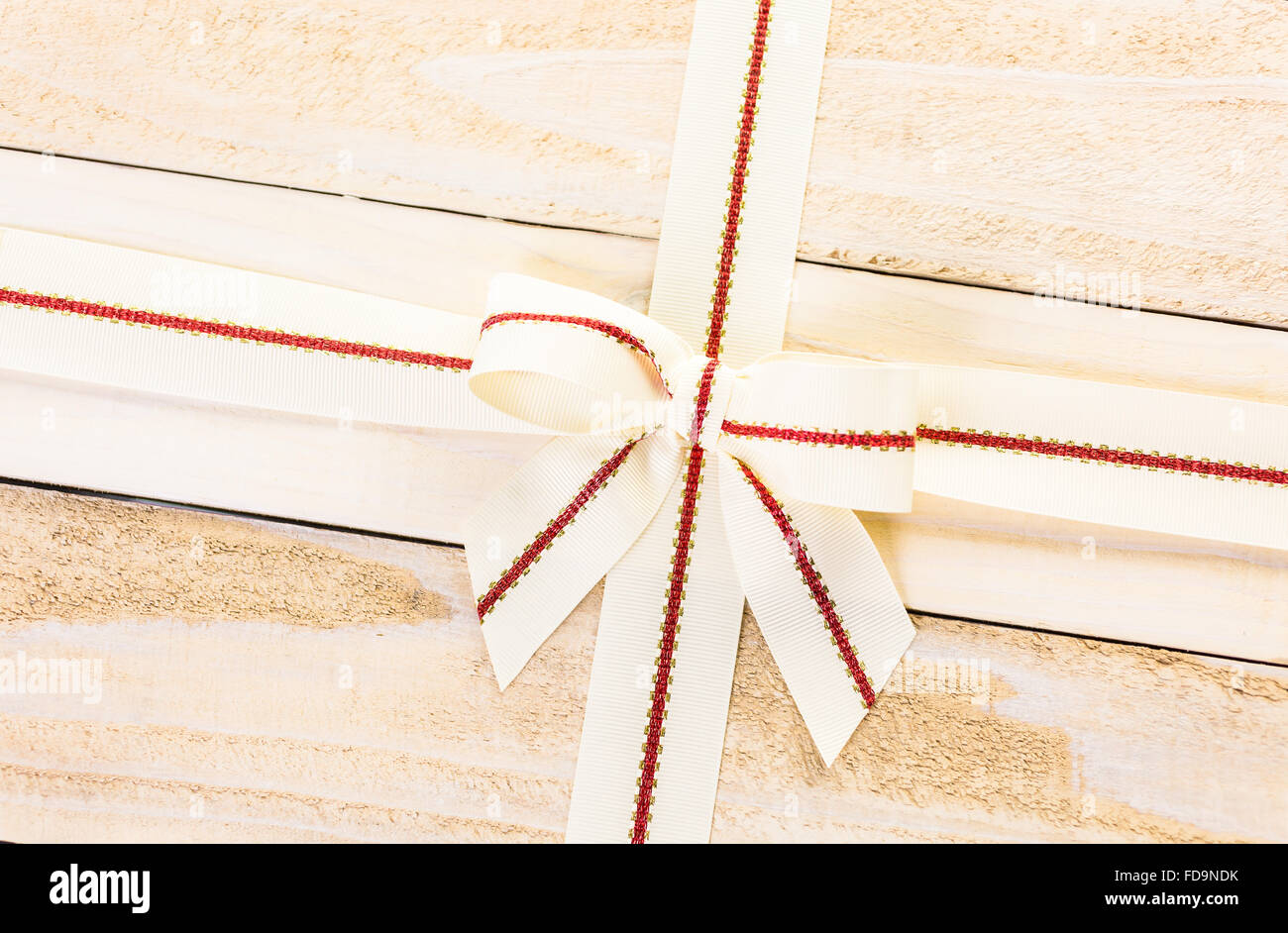 Classic bow made of wide white ribbon Stock Photo - Alamy