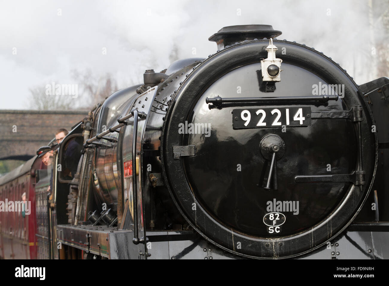 BR 9F locomotive 92214 Central Star working a passenger train on the ...