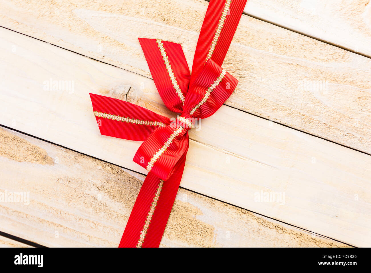 Classic bow made of wide red ribbon Stock Photo - Alamy