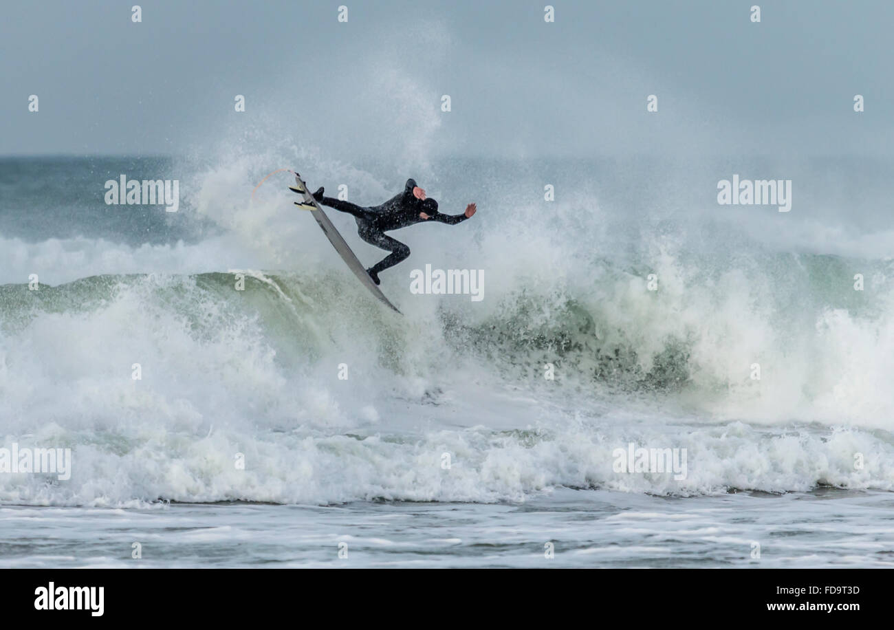 Action surfing in crashing waves Stock Photo - Alamy