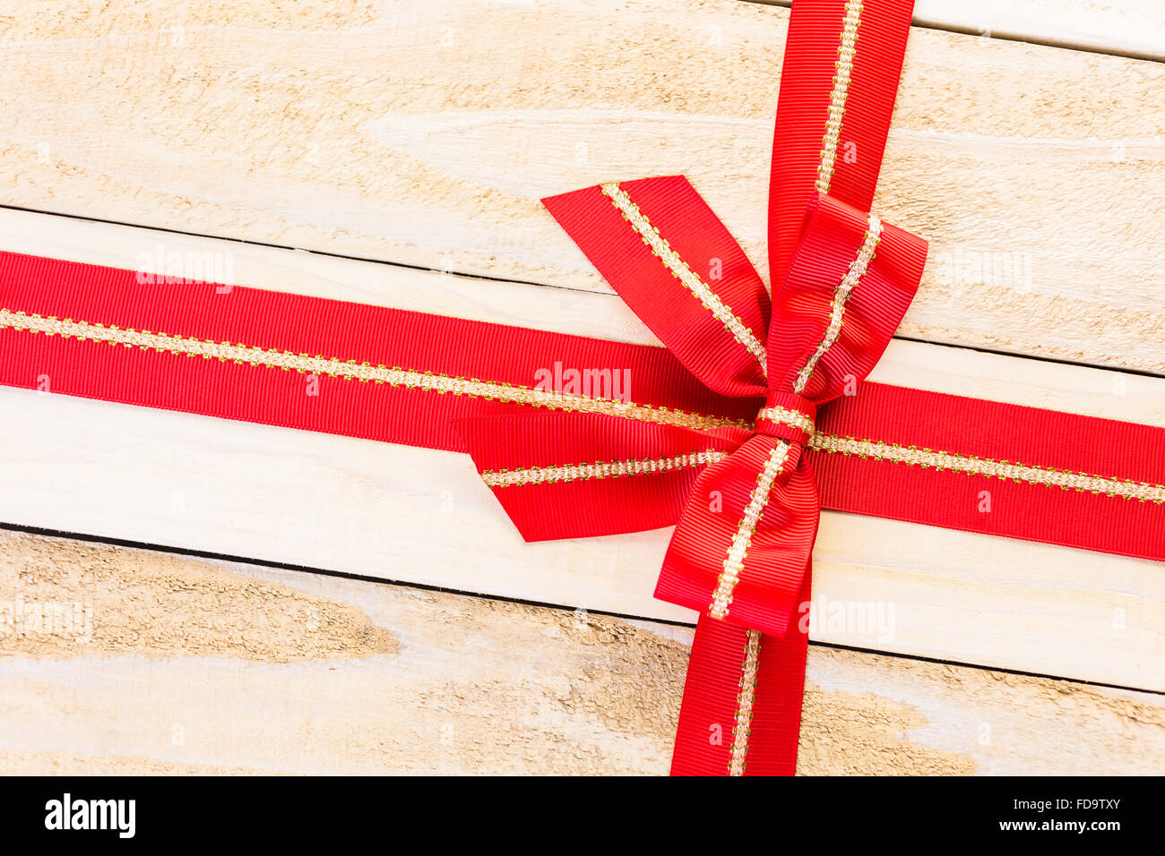 Classic bow made of wide red ribbon Stock Photo - Alamy