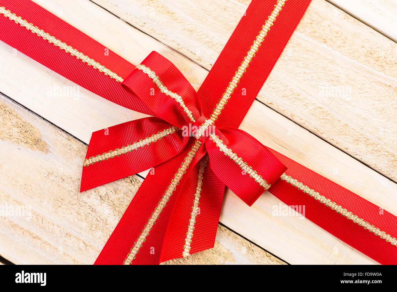 Classic bow made of wide red ribbon Stock Photo - Alamy