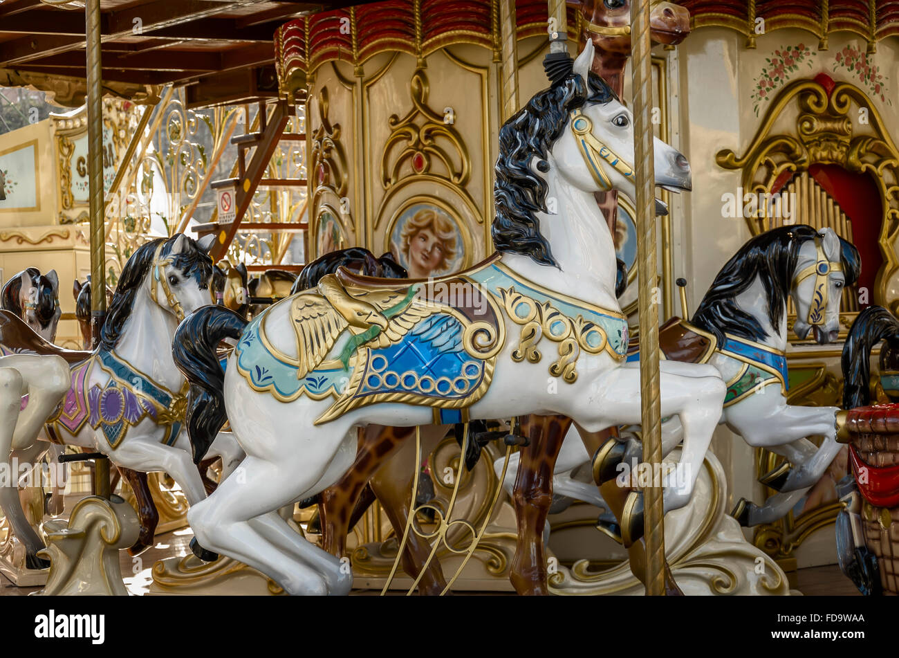 A portable merry go round in a square of Madrid city, Spain Stock Photo ...