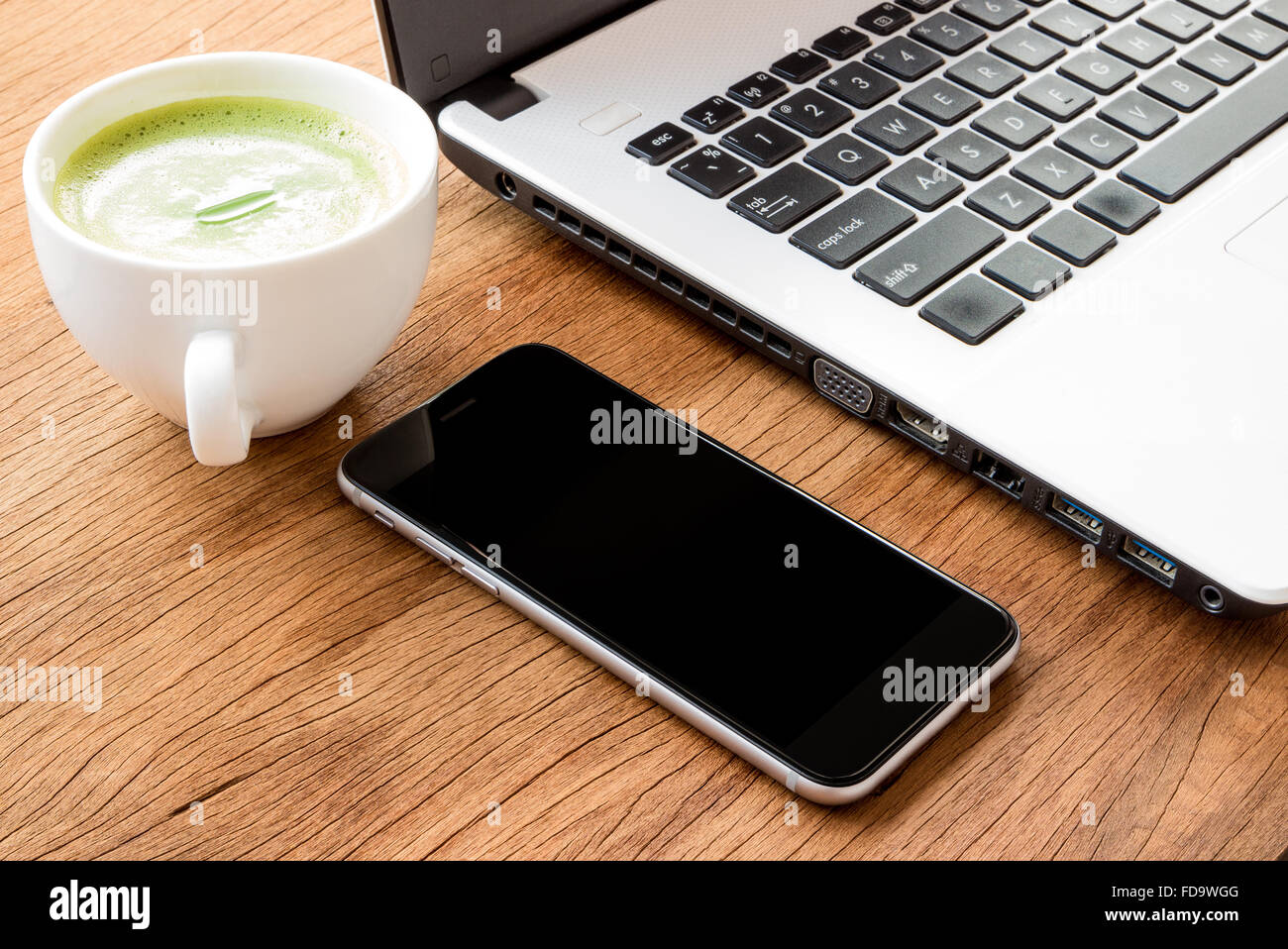 Phone on desk green screen hi-res stock photography and images - Alamy