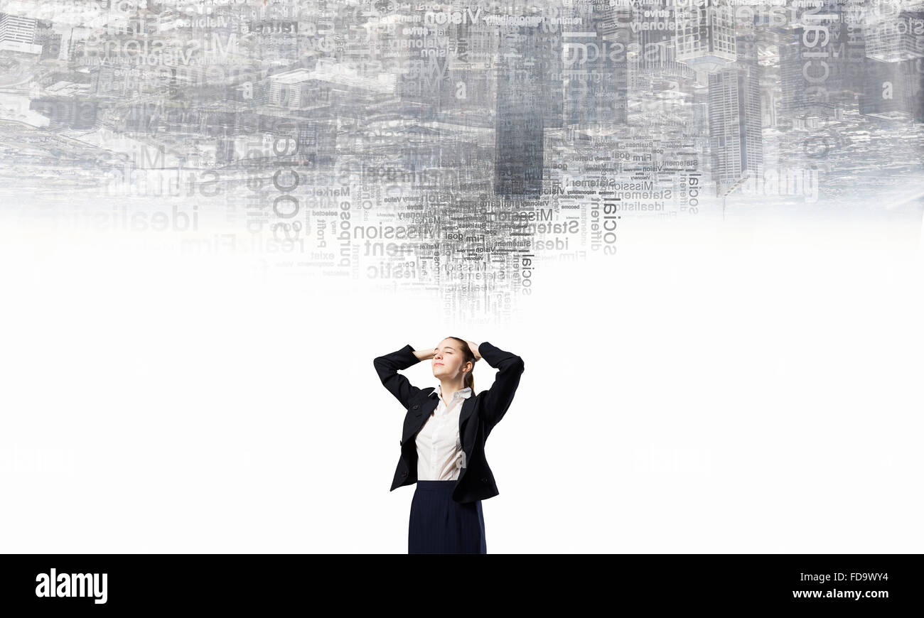 Young businesswoman with hands on head thinking something over Stock ...
