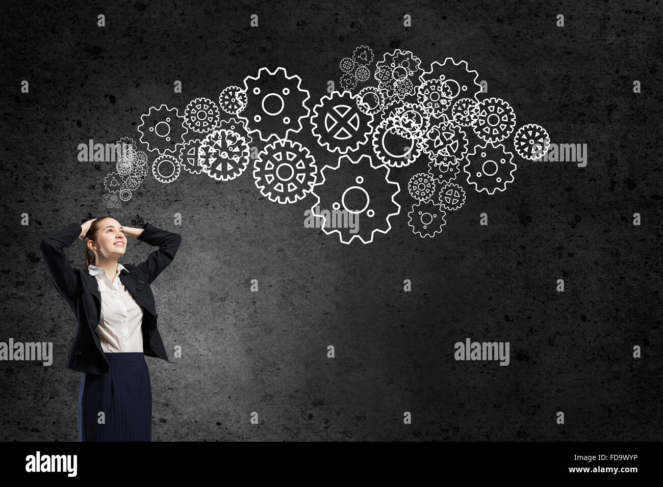 Young businesswoman with hands on head thinking something over Stock ...