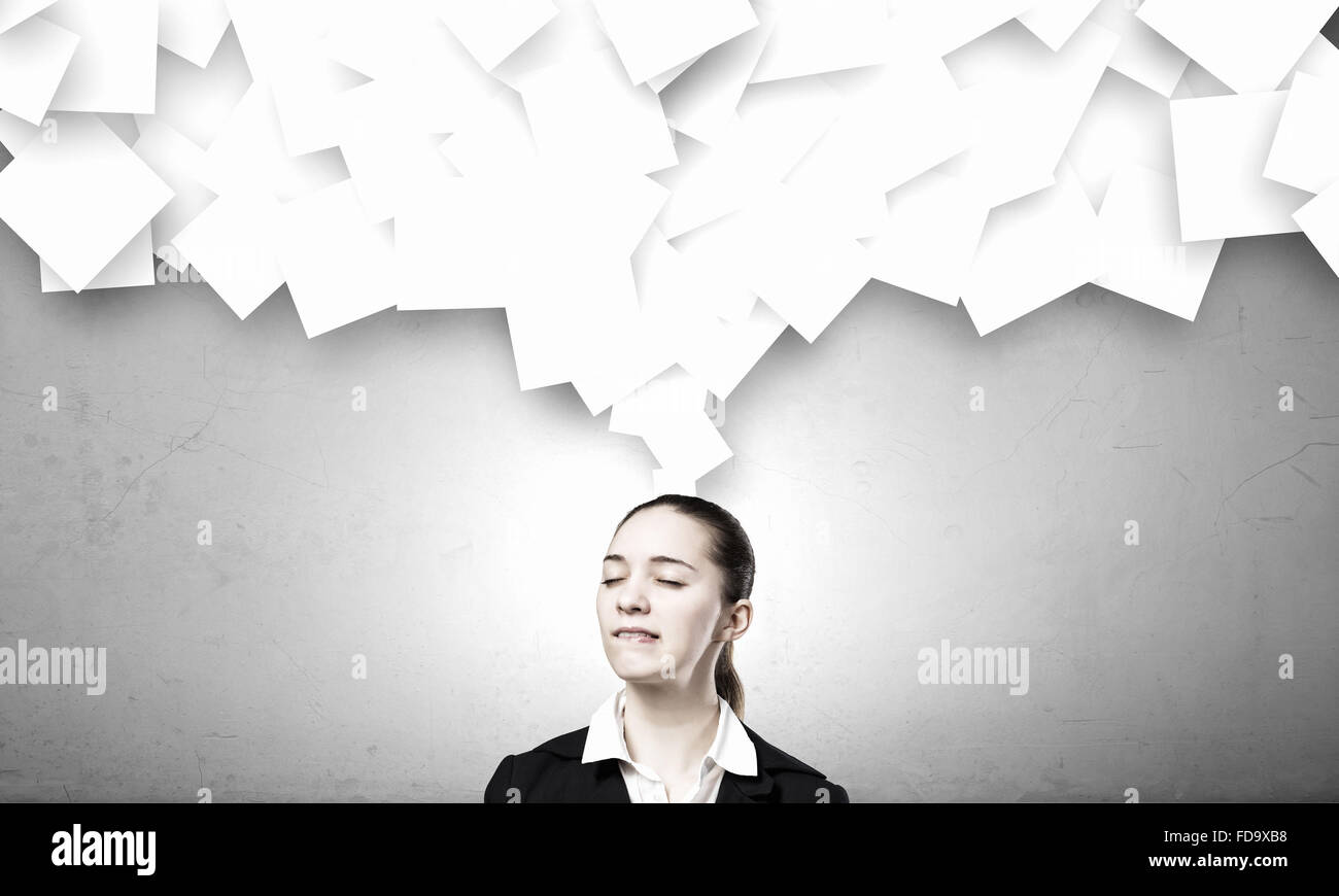 Young businesswoman with closed eyes thinking something over Stock ...