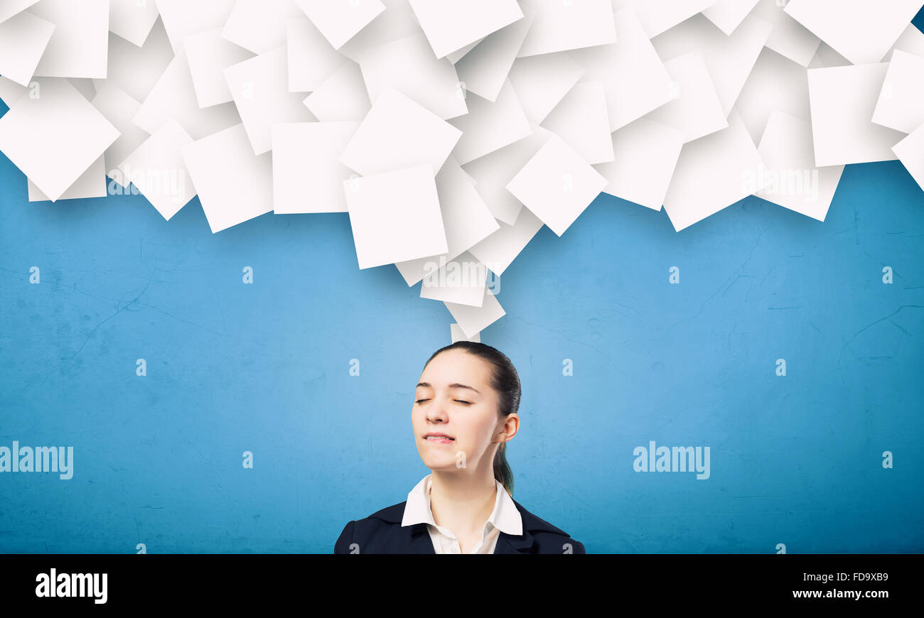 Young businesswoman with closed eyes thinking something over Stock ...