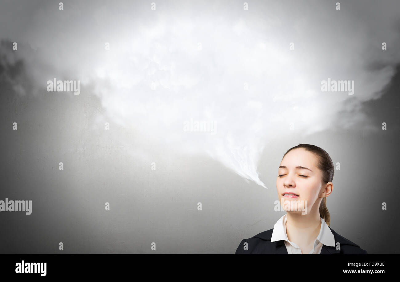 Young businesswoman with closed eyes thinking something over Stock ...