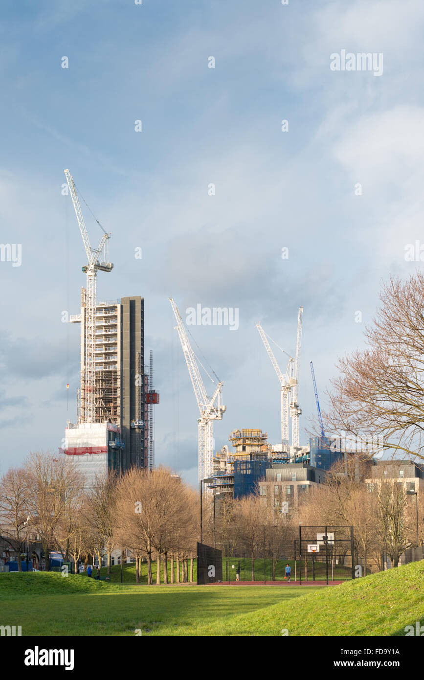 A building site in London UK with cranes constructing new high rise ...