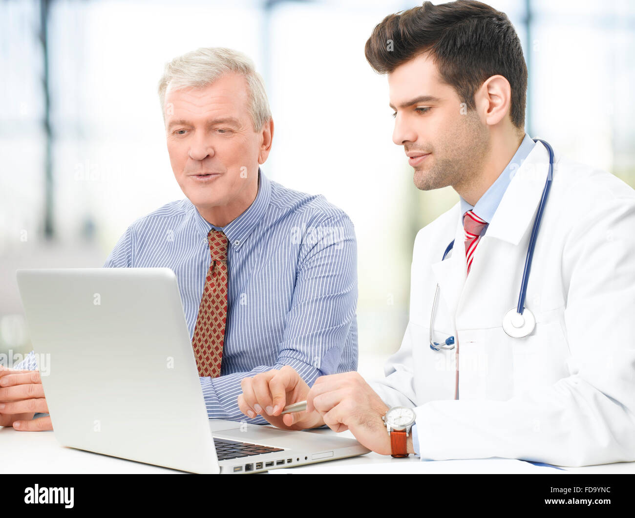 Handsome patient hi-res stock photography and images - Alamy
