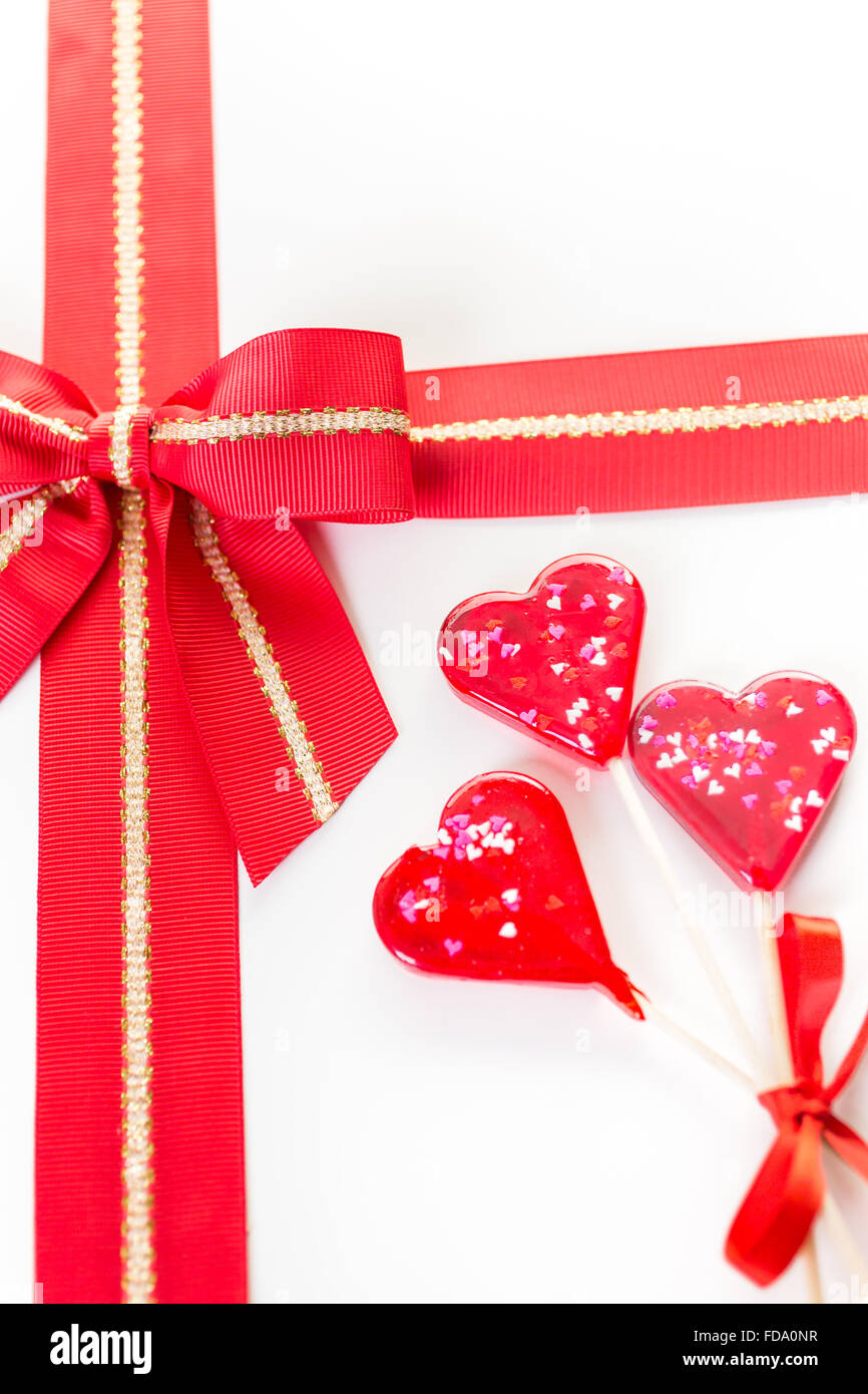 Classic bow made of wide red ribbon Stock Photo - Alamy