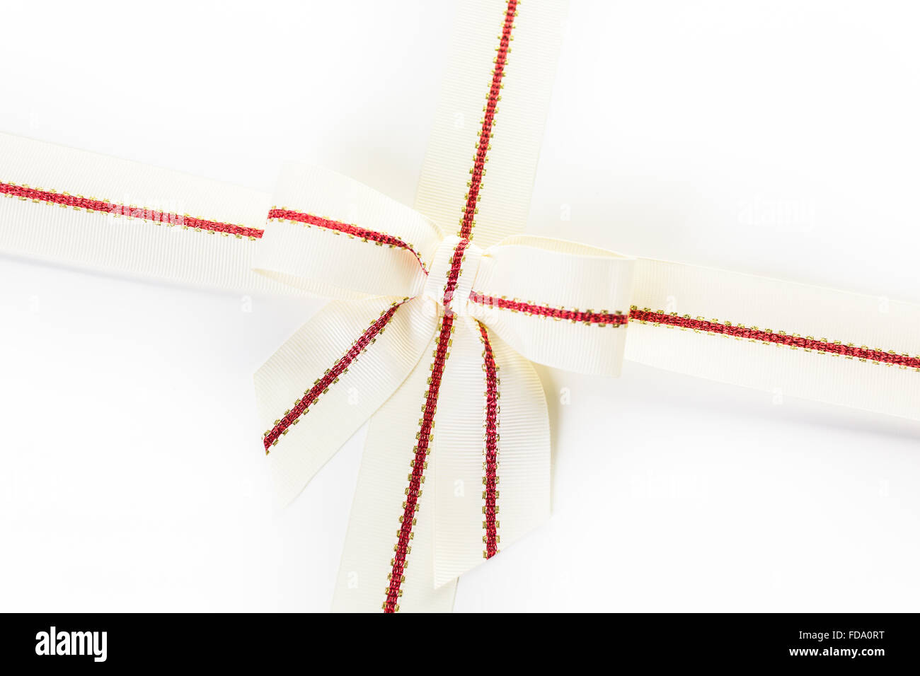 Classic bow made of wide white ribbon Stock Photo - Alamy
