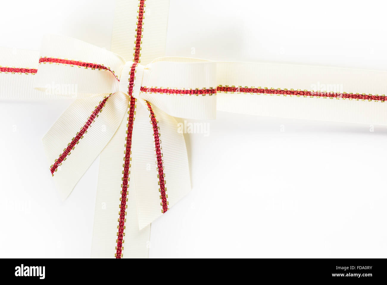 Classic bow made of wide white ribbon Stock Photo - Alamy