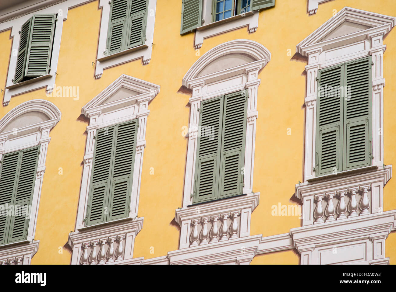 Nice, France. Colorful house wall with windows in Mediterranean style ...