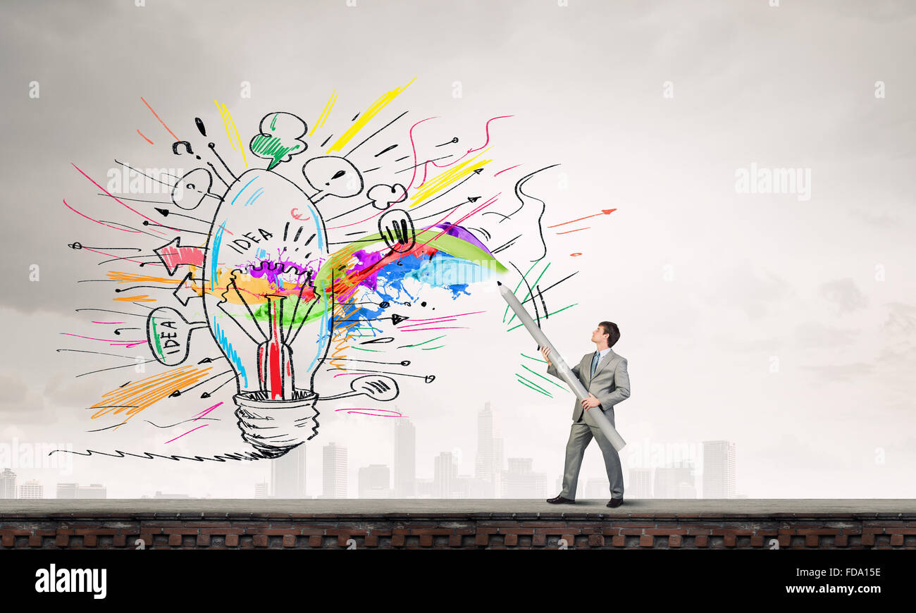 Businessman drawing plan strategy success with huge pencil Stock Photo ...