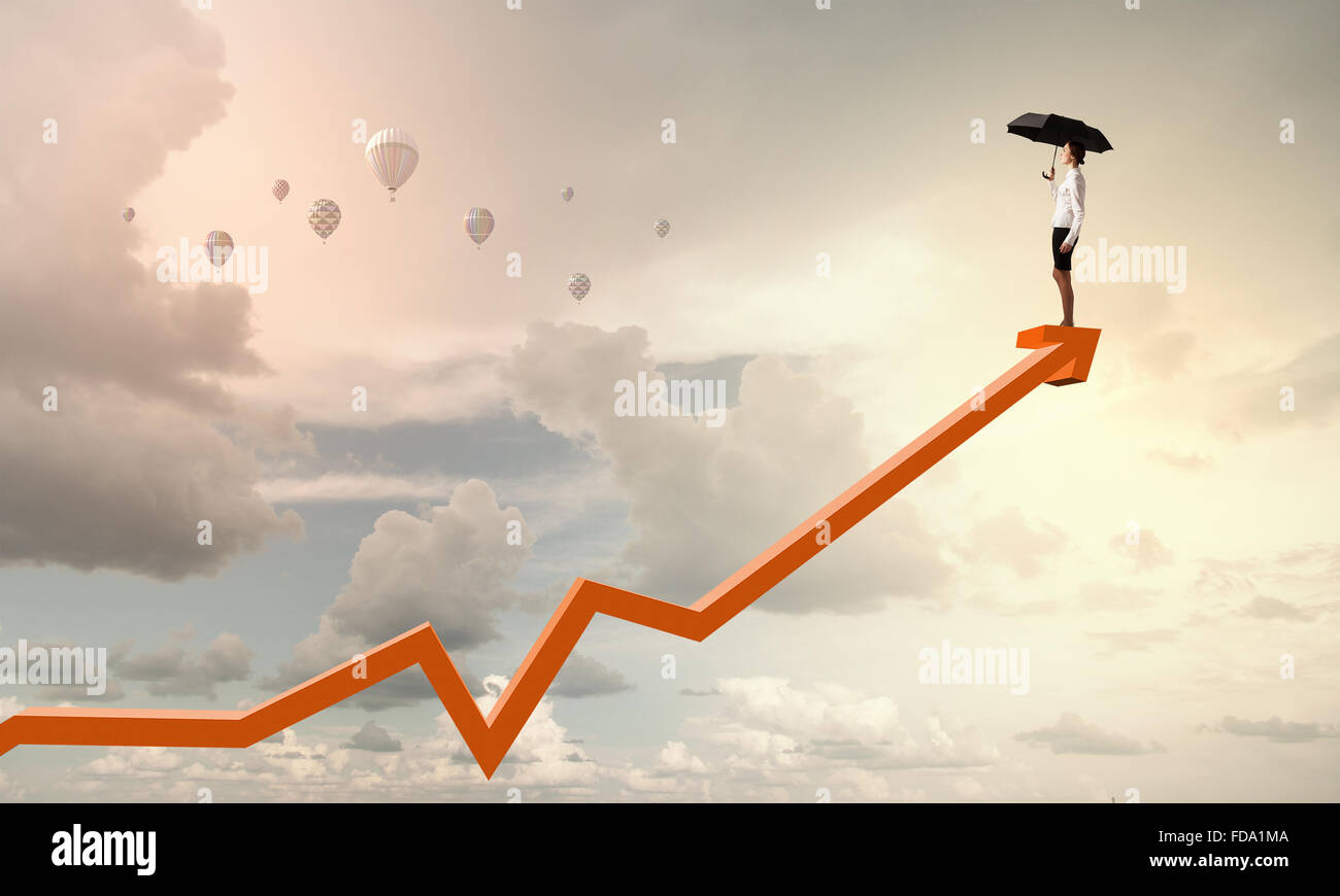 Young businesswoman with black umbrella standing on graph top Stock ...