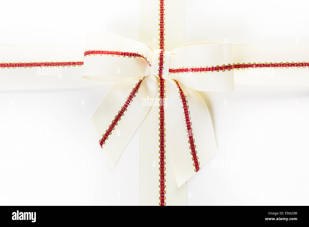 Classic bow made of wide white ribbon Stock Photo - Alamy