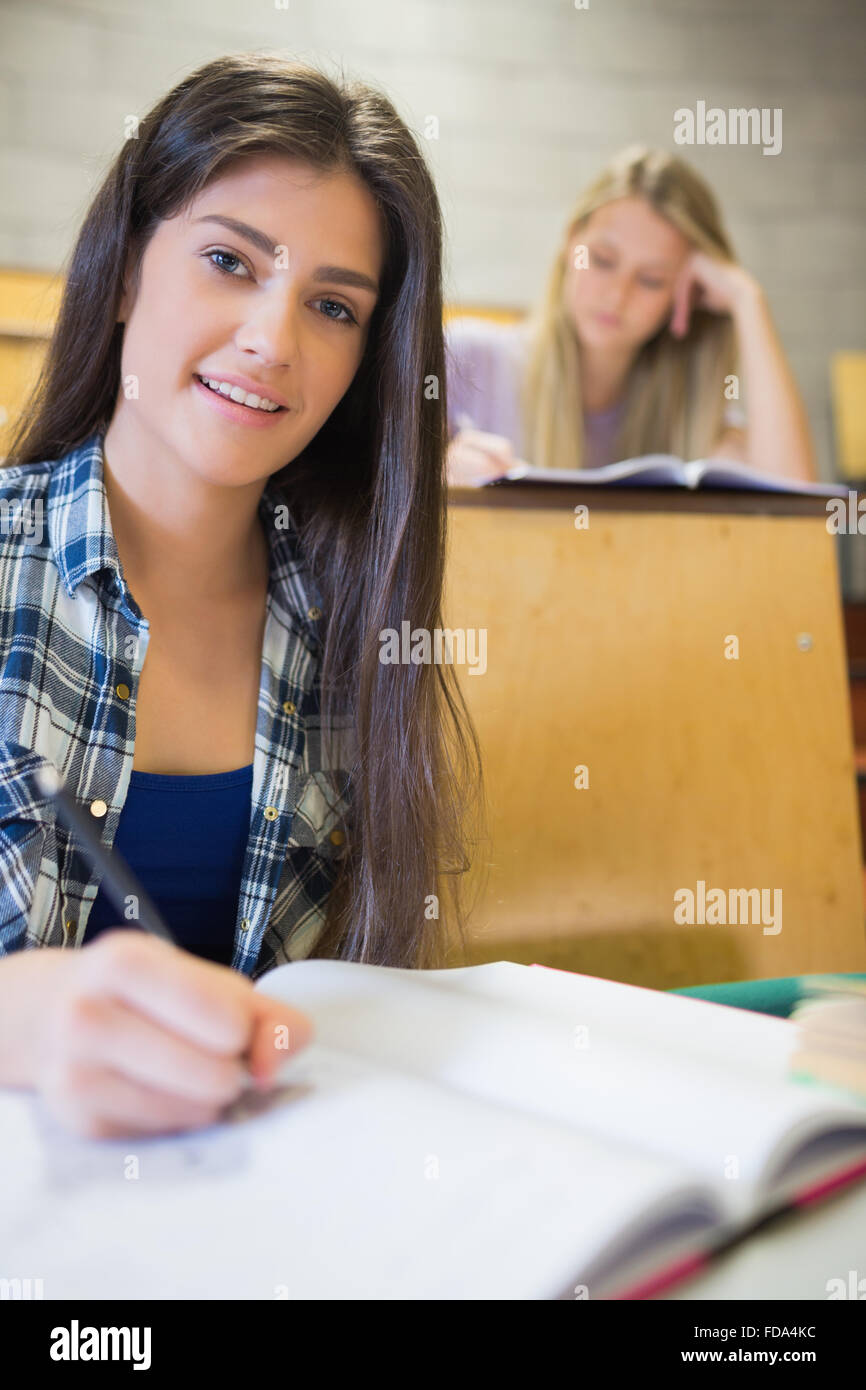 Serious students working in class Stock Photo - Alamy
