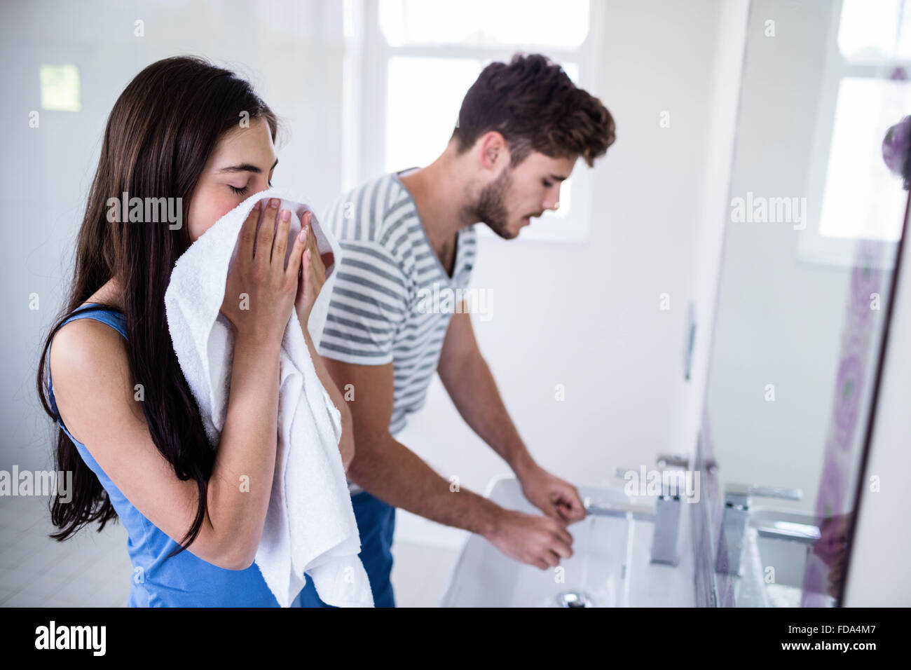Man watching woman in bathroom hi-res stock photography and images - Alamy