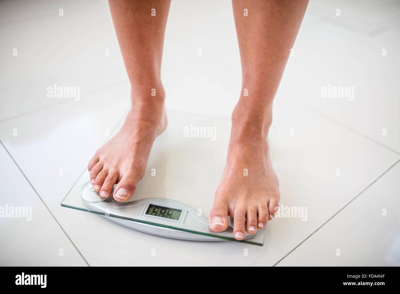 Weighing scale feet hi-res stock photography and images - Alamy